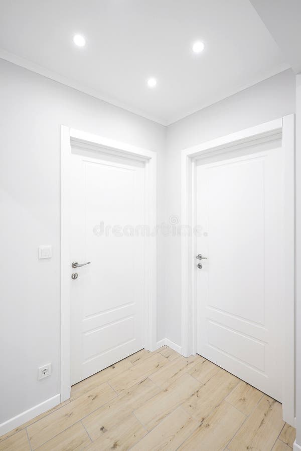 Hallway with White Interior Doors in the Interior Stock Image - Image ...