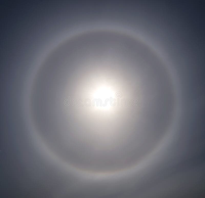 Halo and Sun in the Sky Clouds and a Thin Layer of Cirrus Clouds. Stock ...