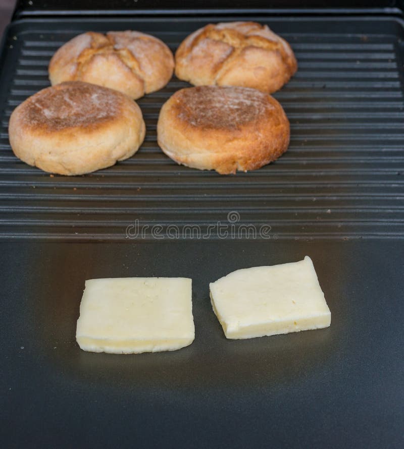 Haloumi Cheese Squares and Burger Bans on Grill Stock Photo - Image of ...