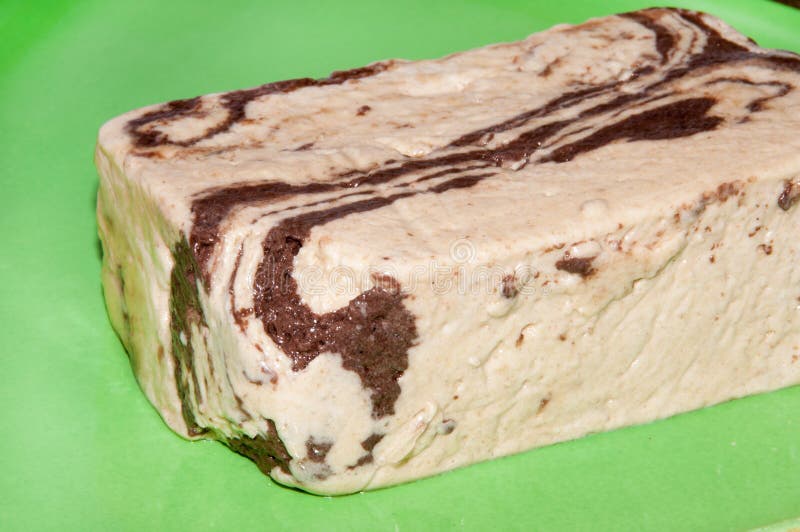 Halva with Chocolate on the Green Plate Stock Photo - Image of cacao ...
