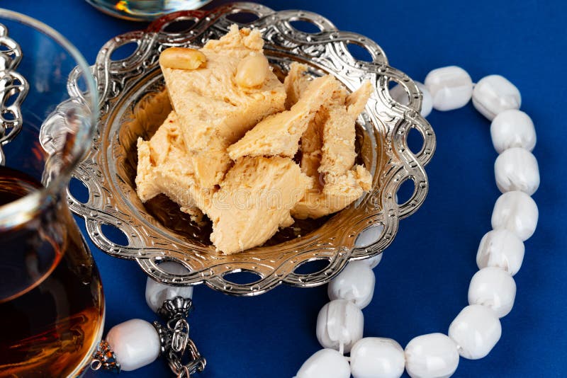 Halva Dessert With Tea Cup On Blue Background Stock Photo - Image of ...