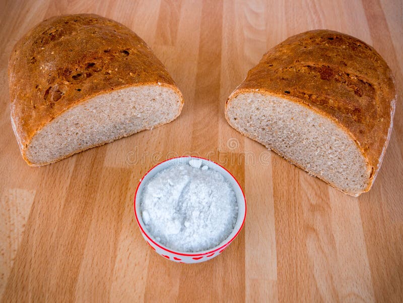 Halved Homemade Traditional Bread and Salt in a Bowl Stock Image ...