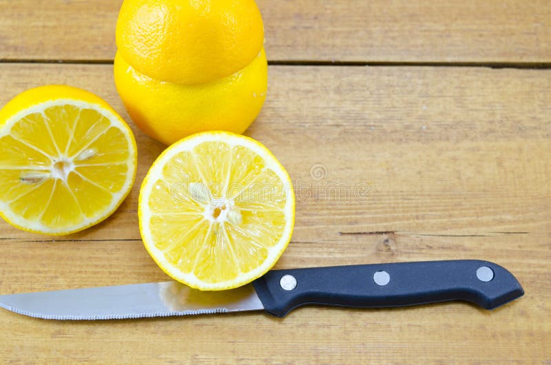 132 Halved Lemon Knife Stock Photos - Free & Royalty-Free Stock Photos ...
