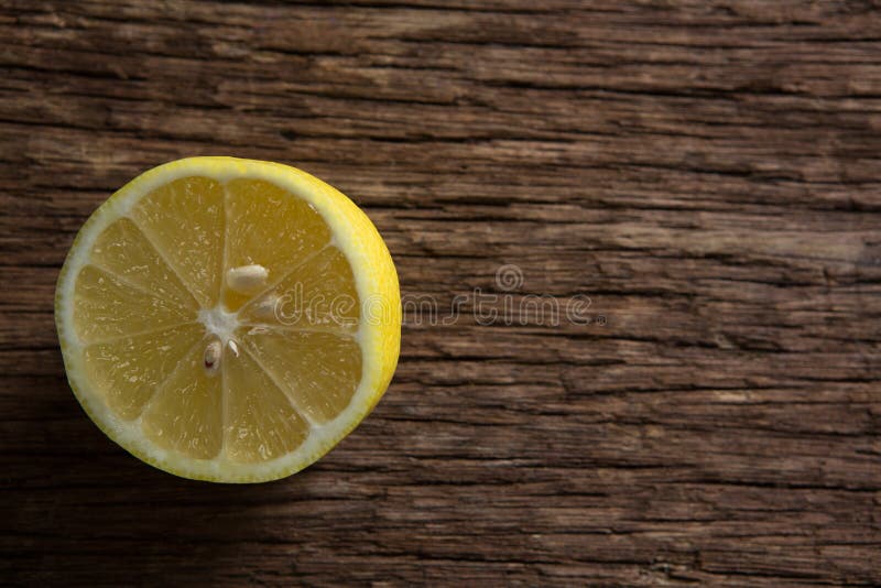 Halved Lemon on Wooden Table Stock Photo - Image of delicious, table ...