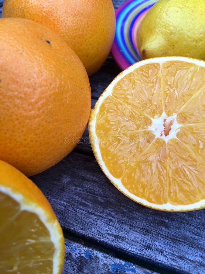 Halved orange in closeup stock image. Image of closeup - 76407491