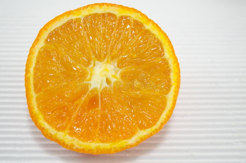 Halved Orange on a White Cardboard Close Up Stock Image - Image of ...