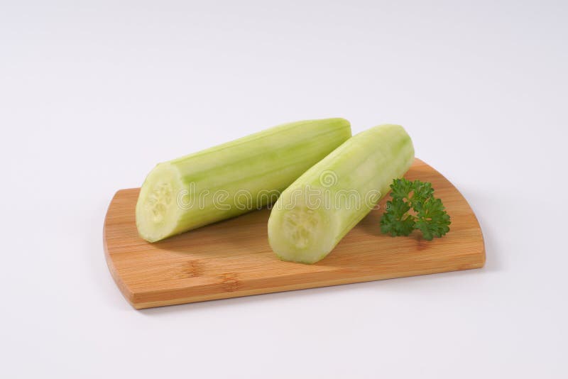 Peeled Cucumber On A Wooden Board Stock Image - Image of peeled, fresh ...