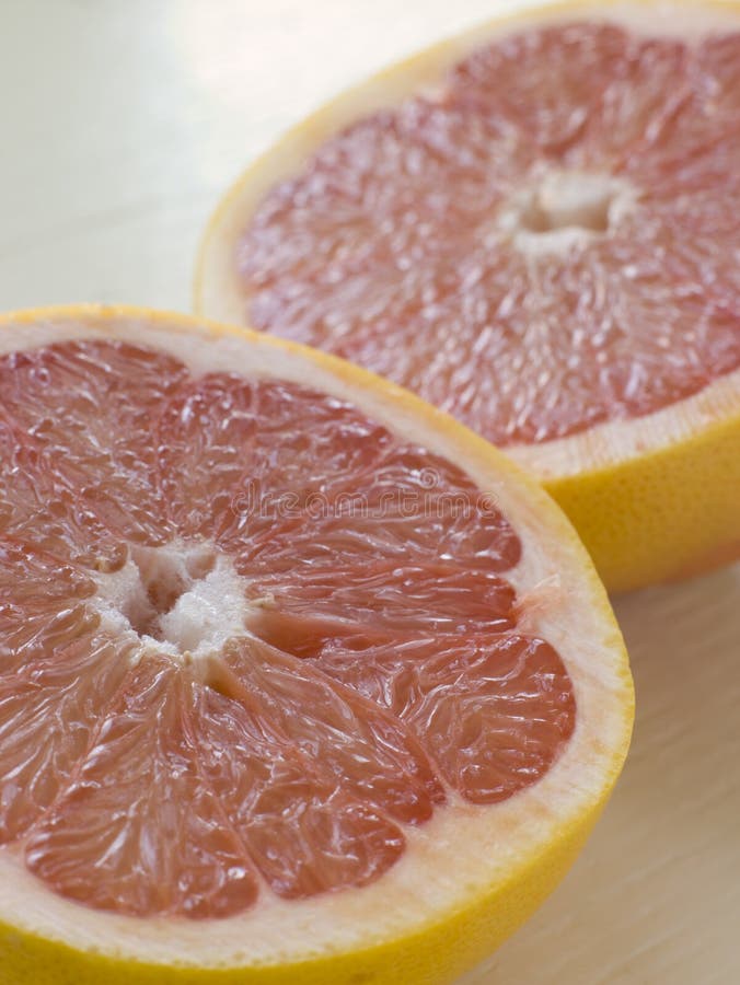 Halved Pink Grapefruit stock photo. Image of herb, objects - 7229458