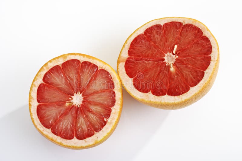 Halved ruby grapefruit stock image. Image of fruit, food - 50486325