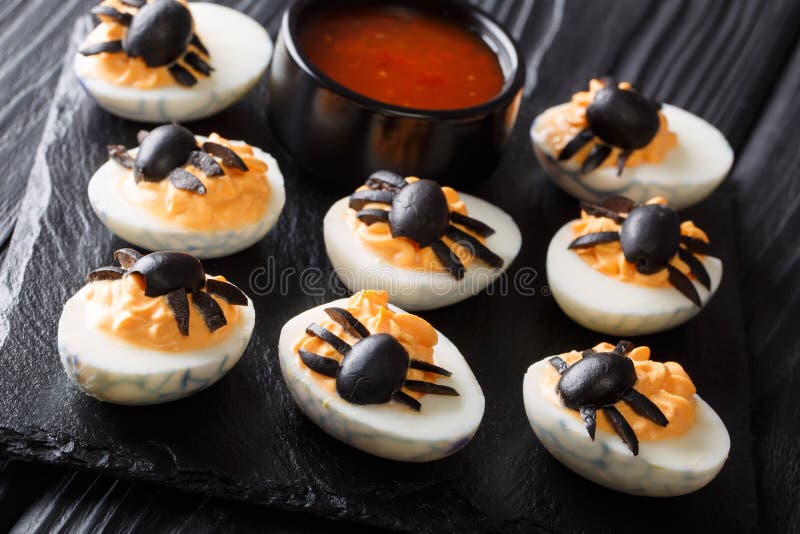 Halves Devilish Eggs Decorated with Olive Spiders Close-up Serve Stock ...