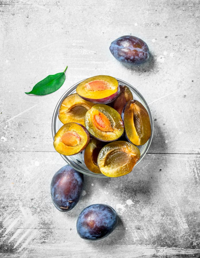 Halves of Fragrant Plum in a Glass Bowl Stock Image - Image of harvest ...