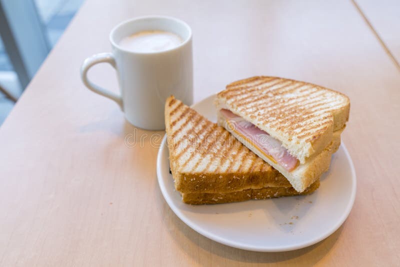 Ham and Cheese Sandwich with a Cup of Coffee for Breakfast Stock Photo ...