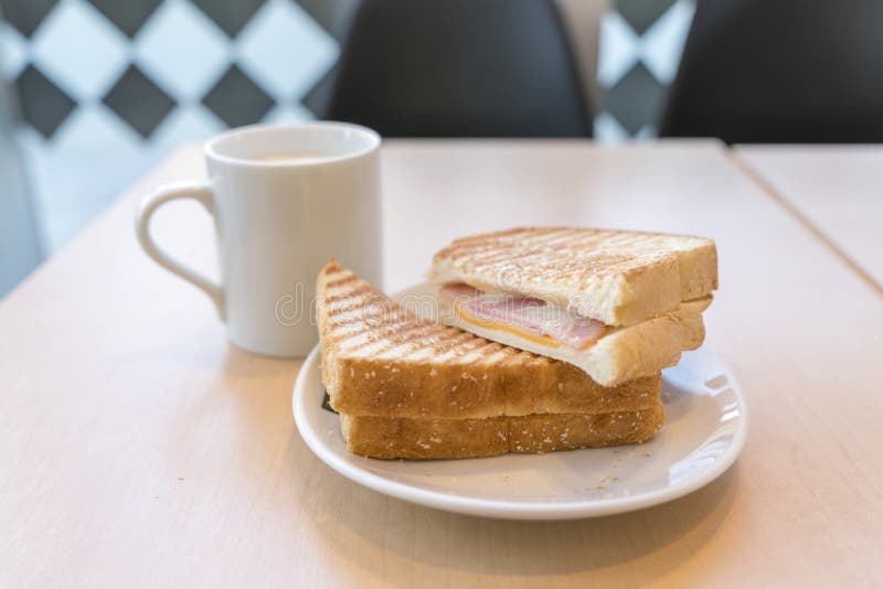 Ham and Cheese Sandwich with a Cup of Coffee for Breakfast Stock Image ...