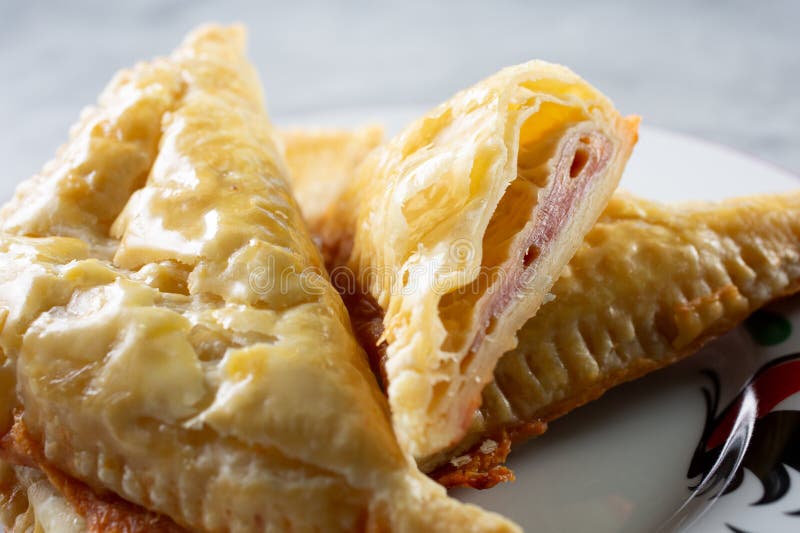 Ham and cheese turnover stock photo. Image of puff, plate - 281144424