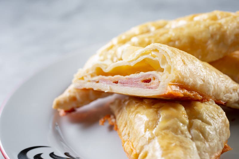 Ham and cheese turnovers stock image. Image of open - 281144429