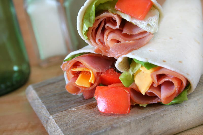 Ham and Cheese Wrap stock photo. Image of bread, eating - 144674254