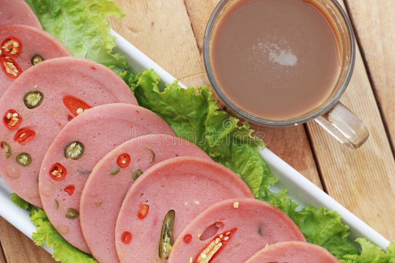 Ham Cut into Circular Discs with Red Peppers and Hot Coffee Stock Image ...