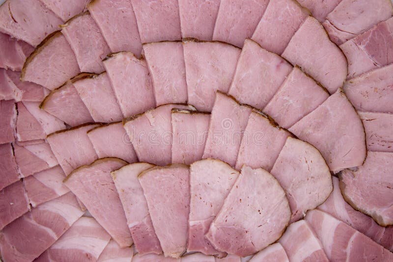 Ham Cut into Slices Forms Delicious Background Stock Photo - Image of ...