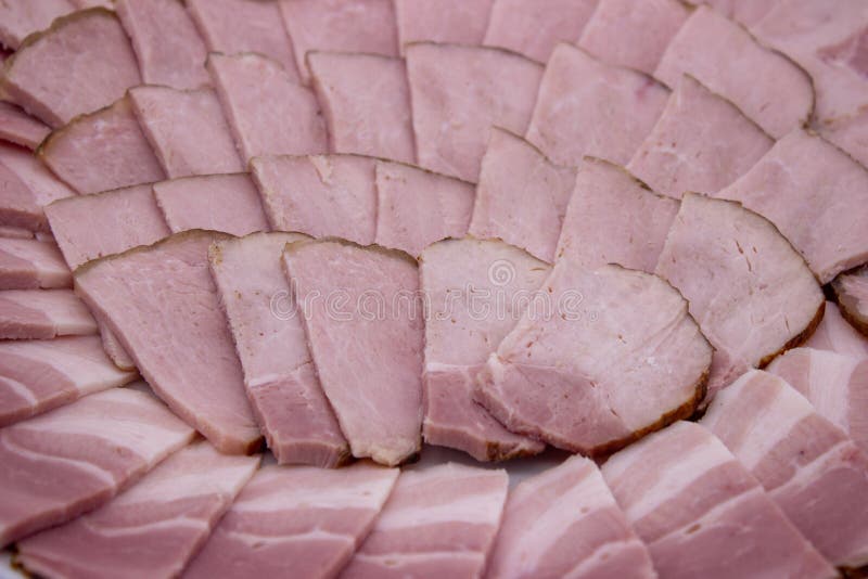 Ham Cut into Slices Forms Delicious Background Stock Image - Image of ...