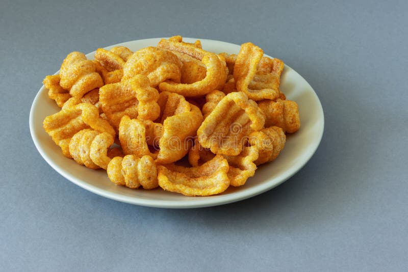 Ham Flavored Chips Snacks on a Plate on a Gray Background Stock Image ...