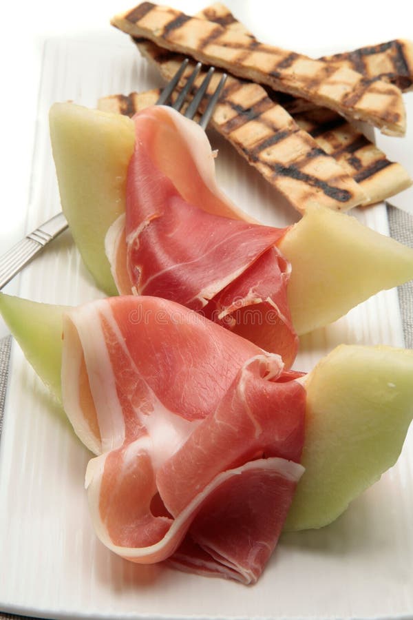 Ham and melon dinner stock image. Image of restaurant - 17652869
