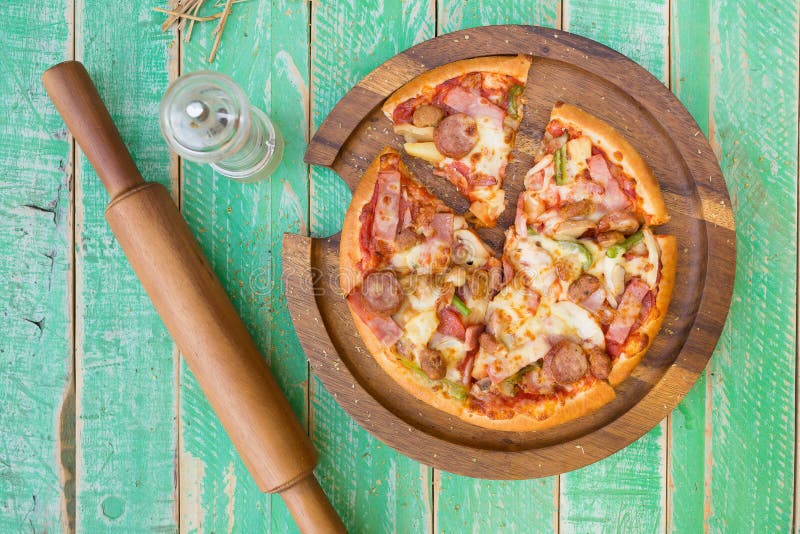 Ham, Mushroom and Olive Pizza, Top View of Pizza on Rustic Table Stock ...