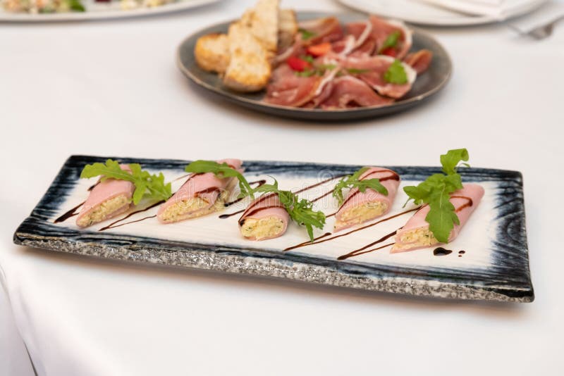 Ham Rolls with Cheese on a Table Stock Photo - Image of dinner, plate ...