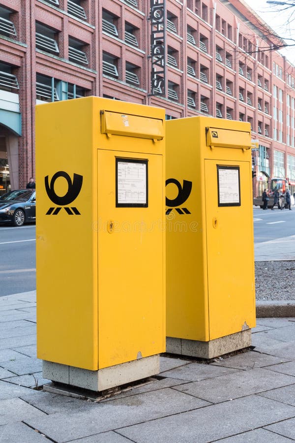 Yellow Deutsche Post Mail Boxes on a Street in a German City Editorial ...