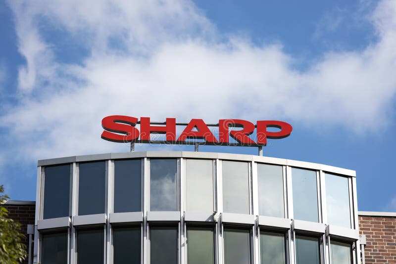 Sign of Sharp on a Building Editorial Photography - Image of company ...
