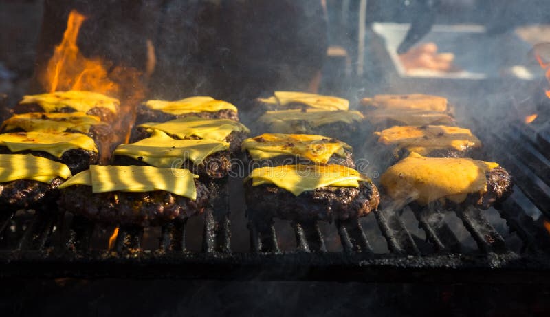 Hamburger Being Grilled Over a Wood Fire Stock Photo - Image of burger ...