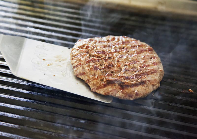 Hamburger over grill stock image. Image of onion, tomato - 68493209