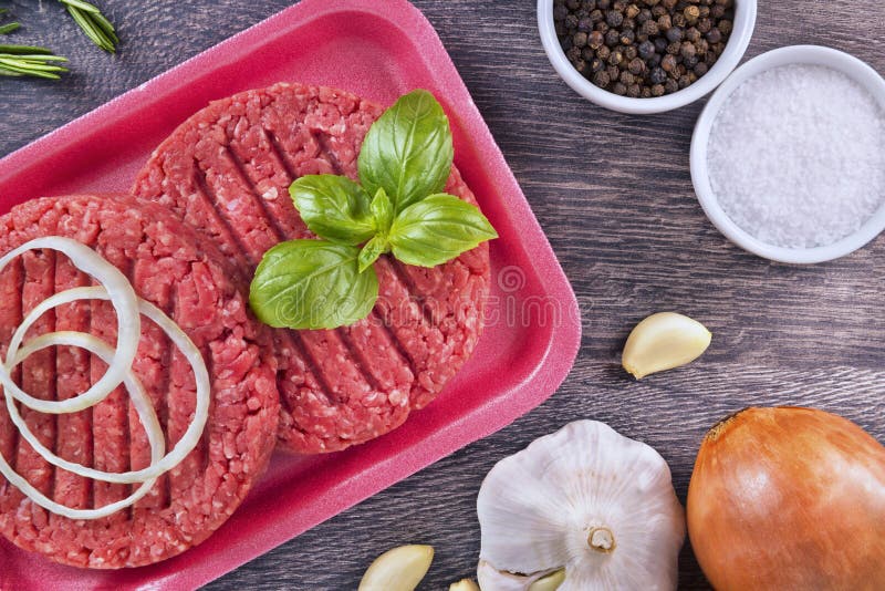 Hamburger patties stock photo. Image of garlic, container - 62476076