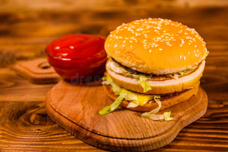 Hamburger and Sauce on a Wooden Table Stock Image - Image of cuisine ...