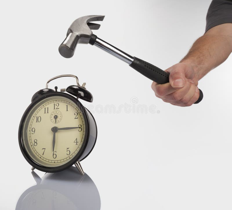 Smashing an Alarm Clock stock photo. Image of doze, slumber - 1099004