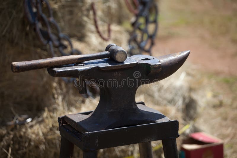 Hammer and anvil stock photo. Image of action, heat, crafts - 30984700