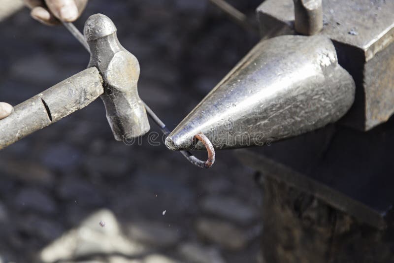 Hammer and anvil to forge stock image. Image of equipment - 50613377