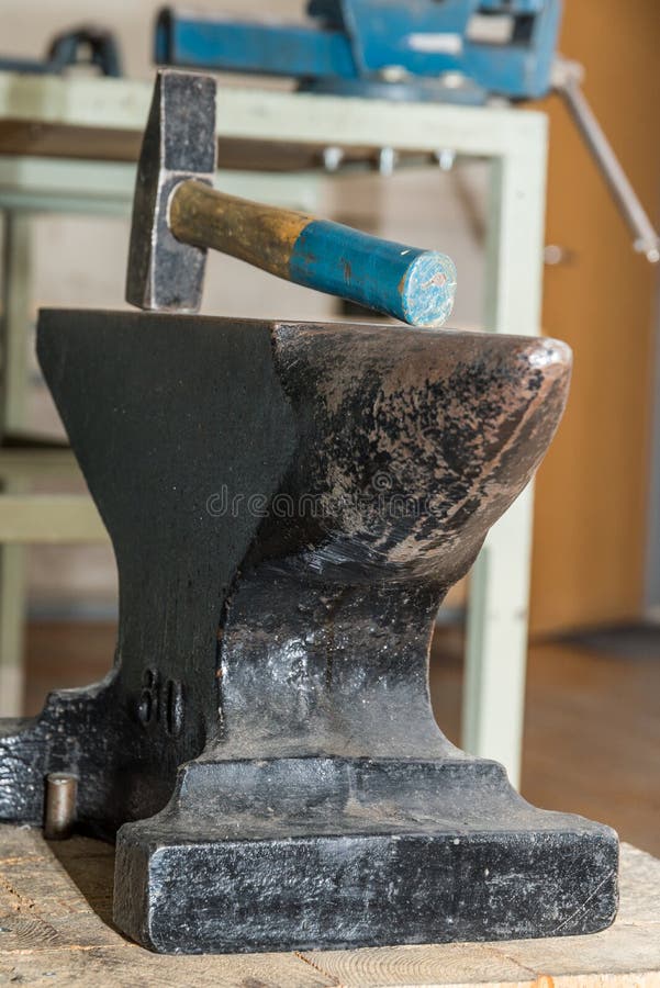 Hammer and anvil workshop stock photo. Image of equipment - 215091186