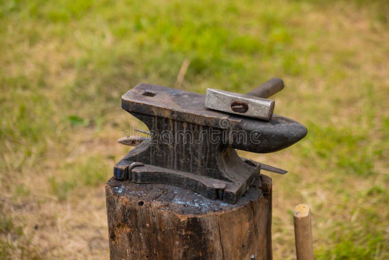 Hammer and Blacksmith Anvil at Outdoor Forge - Close Up Stock Photo ...