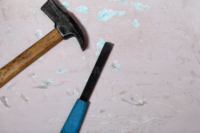 Hammer and Chisel Lie on the Surface with a Shabby Paint Stock Image ...