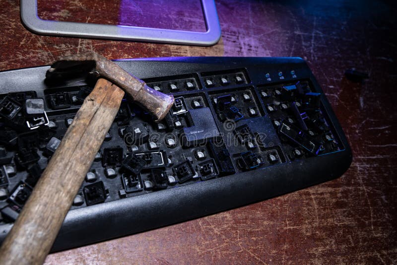 Hammer on Computer Keyboard with Damaged Keys Stock Photo - Image of ...