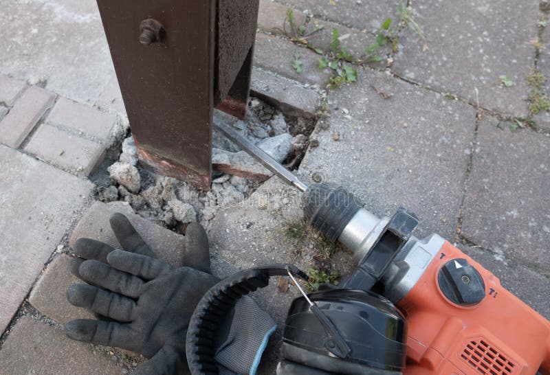 Hammer Drill Next To an Exposed Support Stock Photo - Image of ground ...