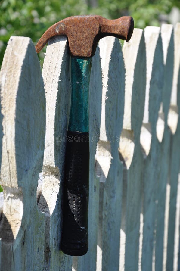 Hammer on Fence stock image. Image of work, garden, craftmanship - 79338591