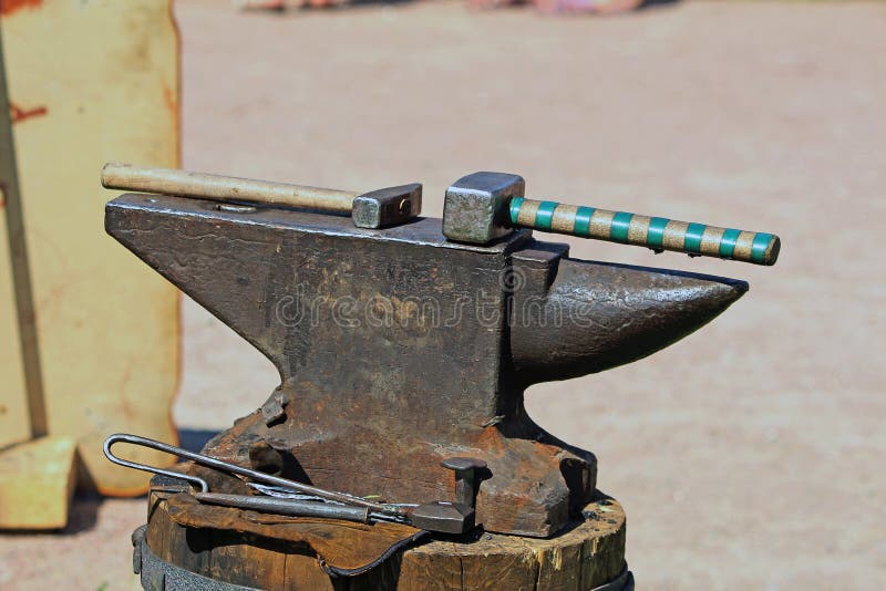 Hammer and a Hammer on an Ancient Anvil Stock Image - Image of iron ...