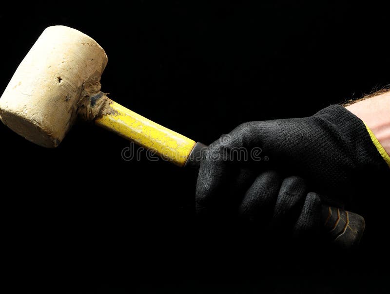Hammer and a Hand stock photo. Image of instrument, carpentry - 246517828