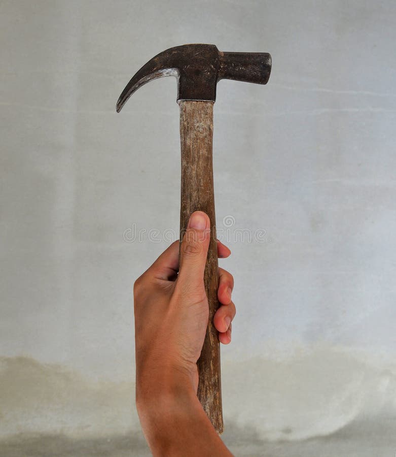 Hammer in hand stock photo. Image of repair, reconstruction - 58640014