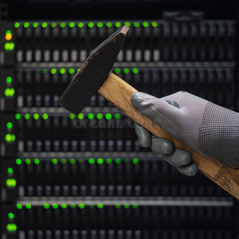Hammer in the Hands of a Man at the Server for Storing Data, Close-up ...