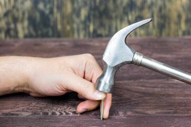 The Man Hit the Finger with a Hammer Stock Photo - Image of improvement ...