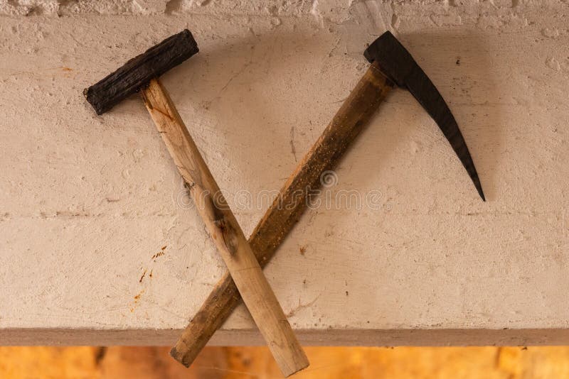 Hammer and Ice Pick on the Wall of the House Stock Image - Image of ...