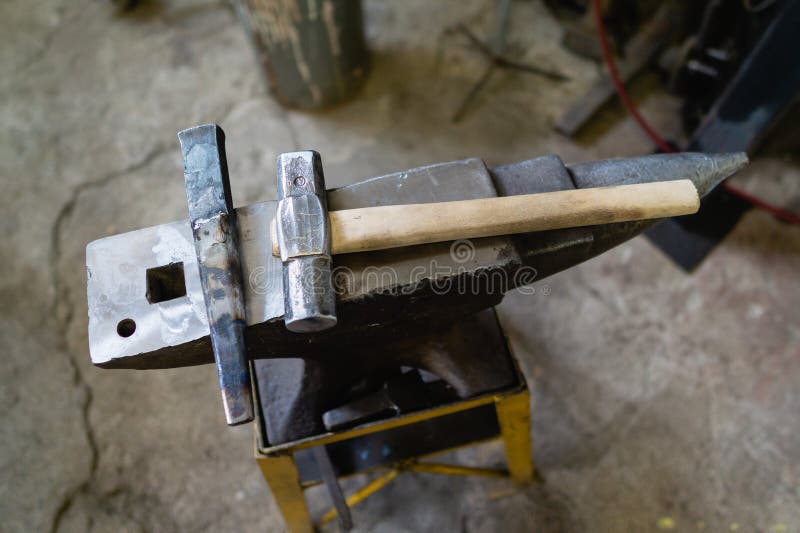 The Hammer Lies on the Anvil. Top View. Stock Image - Image of ...