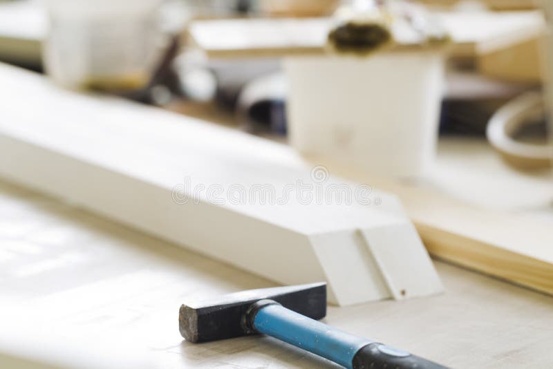 Hammer lying on the table stock photo. Image of bench - 77866228